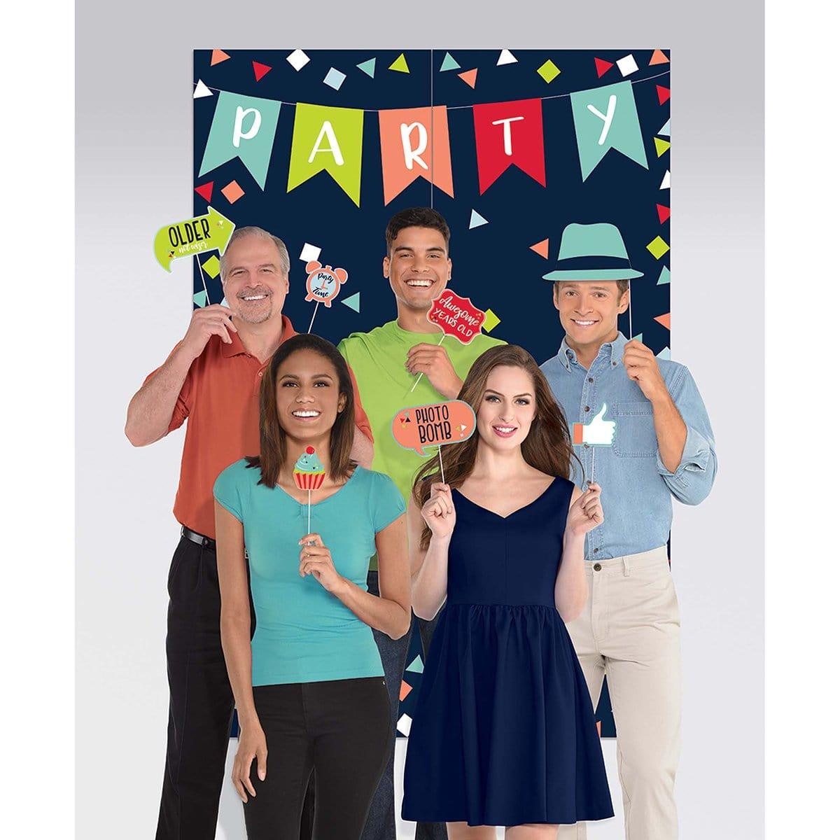 A Reason To Celebrate scene setter with props | Party Expert