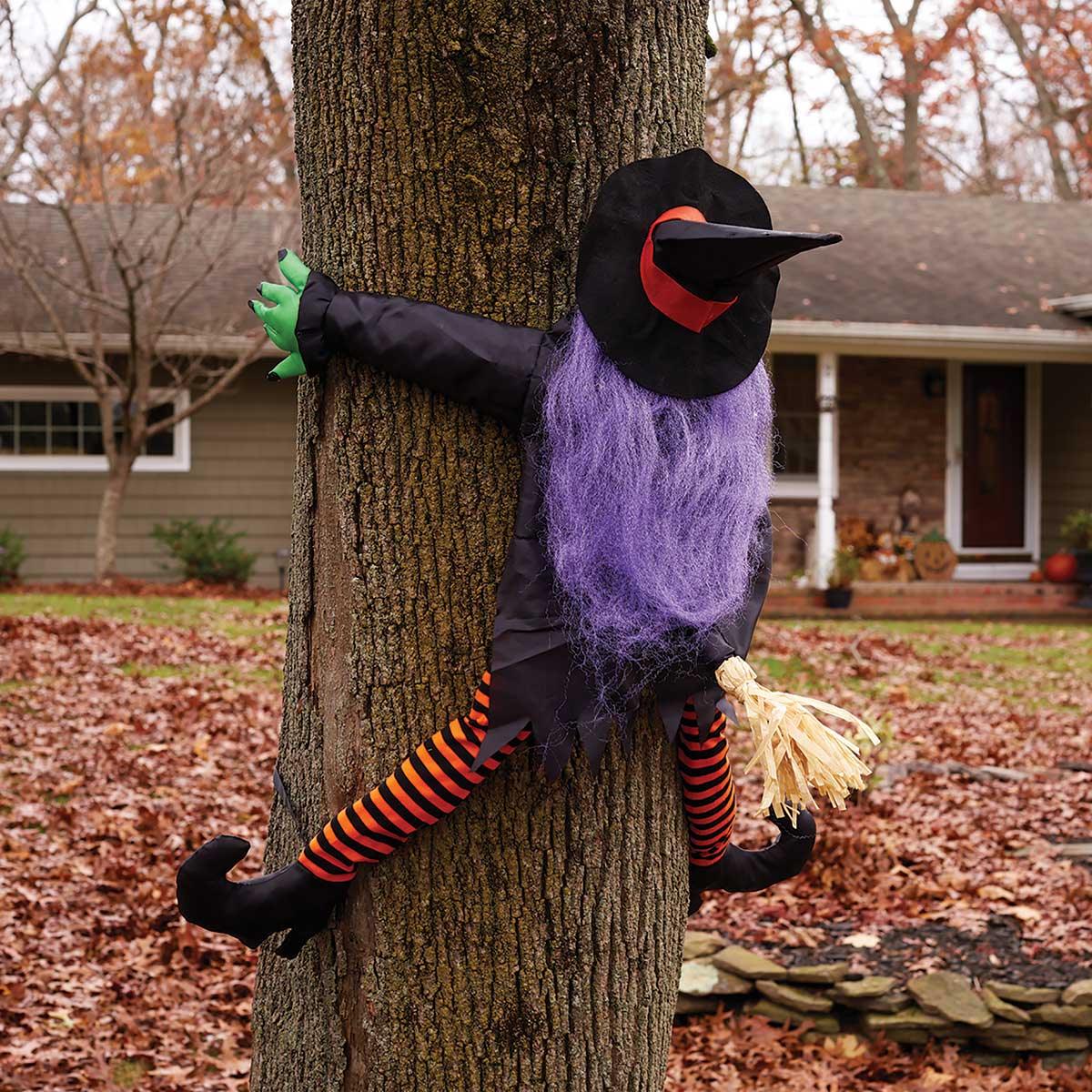 Wrong way Witch Tree Hugger, 36 inches | Party Expert